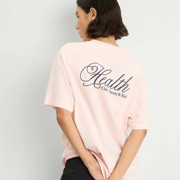 Sporty & Rich Health Script T-Shirt - Pink Dolphin